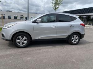 Grey Hyundai ix35 2013 in Kaunas, with an engine capacity of 2.00 L and mileage of 200 thousand km for 5250 €, photo 5 on AUTOMOTO.COM.LV