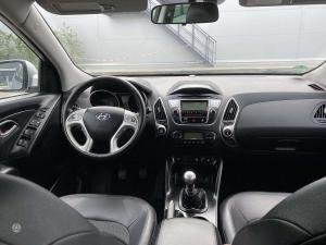 Grey Hyundai ix35 2013 in Kaunas, with an engine capacity of 2.00 L and mileage of 200 thousand km for 5250 €, photo 10 on AUTOMOTO.COM.LV
