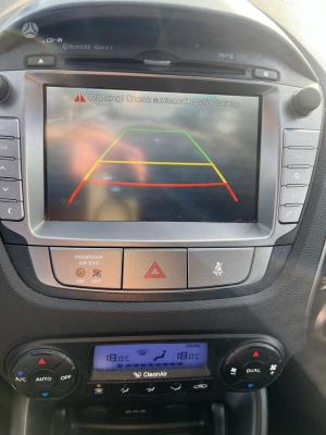 Grey Hyundai ix35 2013 in Panevezys, with an engine capacity of 1.69 L and mileage of 194 thousand km for 5300 €, photo 12 on AUTOMOTO.COM.LV