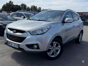 Grey Hyundai ix35 2013 in Vilnius, with an engine capacity of 1.60 L and mileage of 228 thousand km for 5390 €, photo 4 on AUTOMOTO.COM.LV