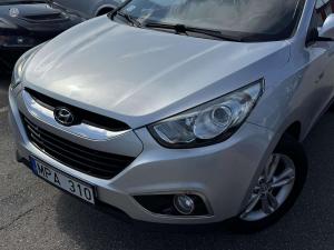 Grey Hyundai ix35 2013 in Vilnius, with an engine capacity of 1.60 L and mileage of 228 thousand km for 5390 €, photo 5 on AUTOMOTO.COM.LV