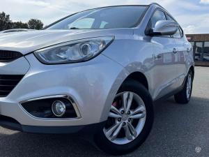 Grey Hyundai ix35 2013 in Vilnius, with an engine capacity of 1.60 L and mileage of 228 thousand km for 5390 €, photo 6 on AUTOMOTO.COM.LV