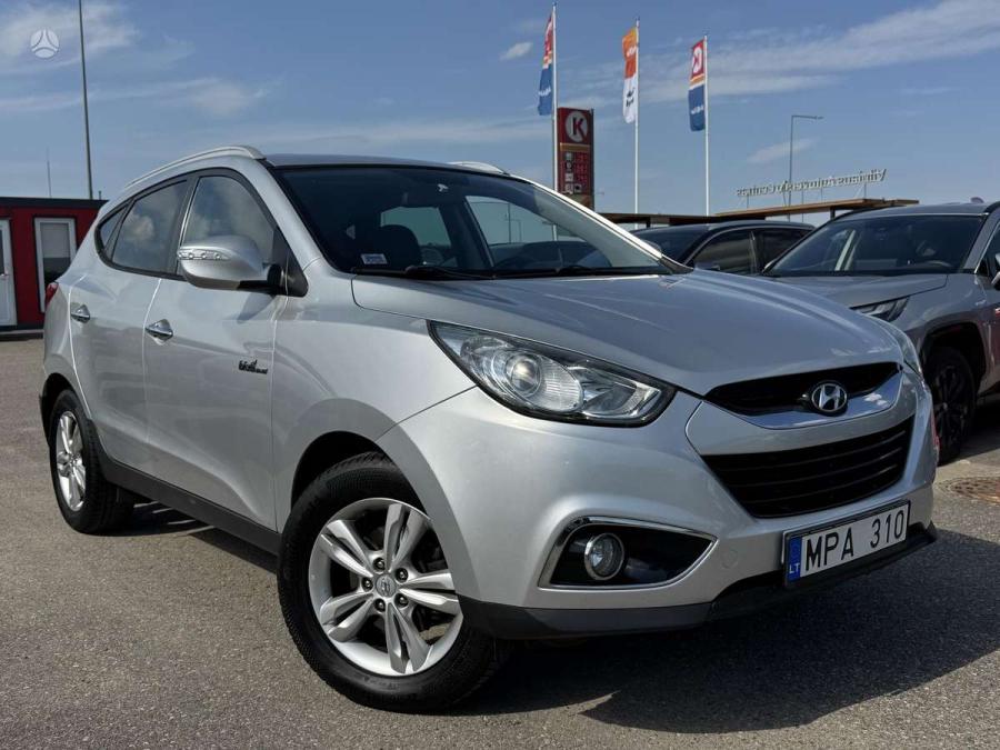 Grey Hyundai ix35 2013 in Vilnius, with an engine capacity of 1.60 L and mileage of 228 thousand km for 5390 €, photo 7 on AUTOMOTO.COM.LV