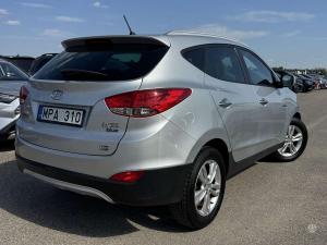 Grey Hyundai ix35 2013 in Vilnius, with an engine capacity of 1.60 L and mileage of 228 thousand km for 5390 €, photo 11 on AUTOMOTO.COM.LV