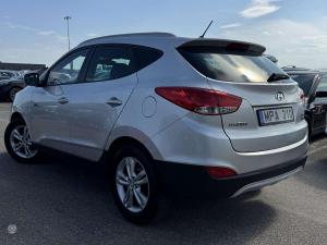Grey Hyundai ix35 2013 in Vilnius, with an engine capacity of 1.60 L and mileage of 228 thousand km for 5390 €, photo 13 on AUTOMOTO.COM.LV