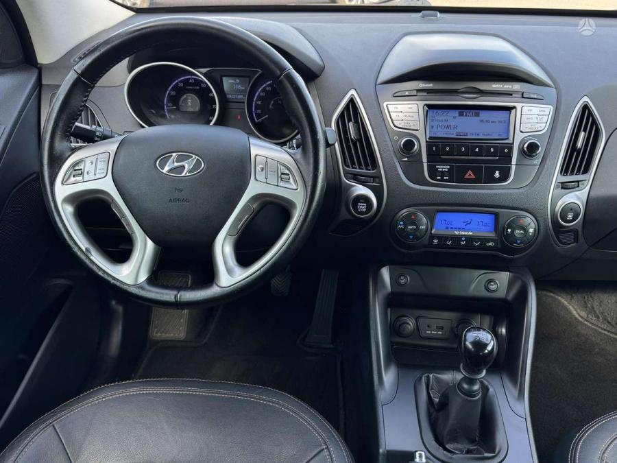 Grey Hyundai ix35 2013 in Vilnius, with an engine capacity of 1.60 L and mileage of 228 thousand km for 5390 €, photo 25 on AUTOMOTO.COM.LV