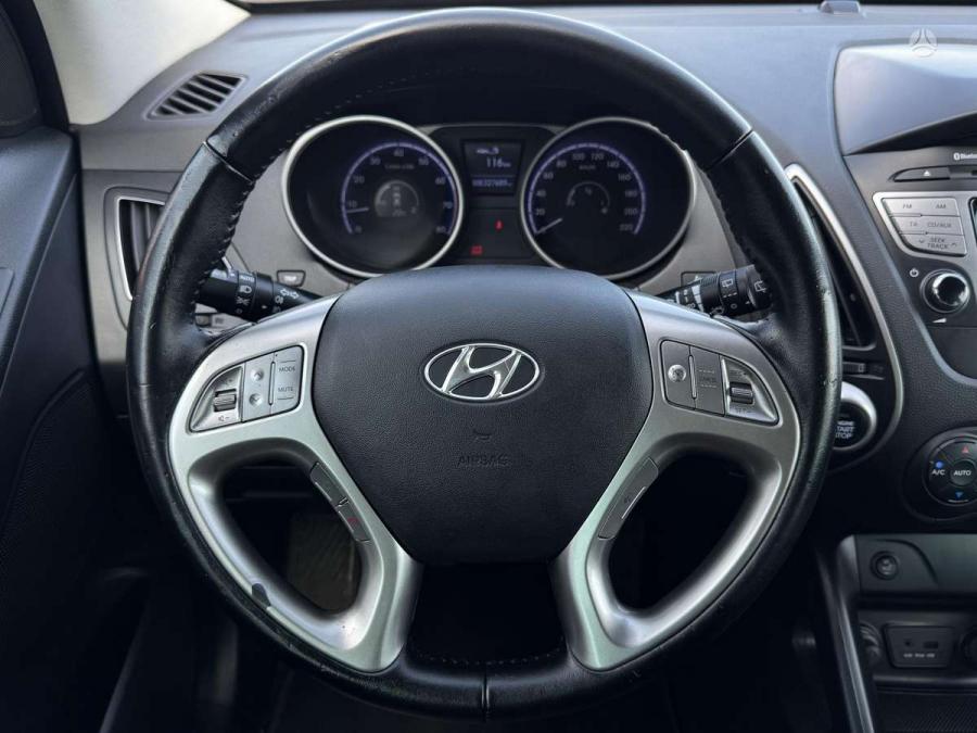 Grey Hyundai ix35 2013 in Vilnius, with an engine capacity of 1.60 L and mileage of 228 thousand km for 5390 €, photo 26 on AUTOMOTO.COM.LV
