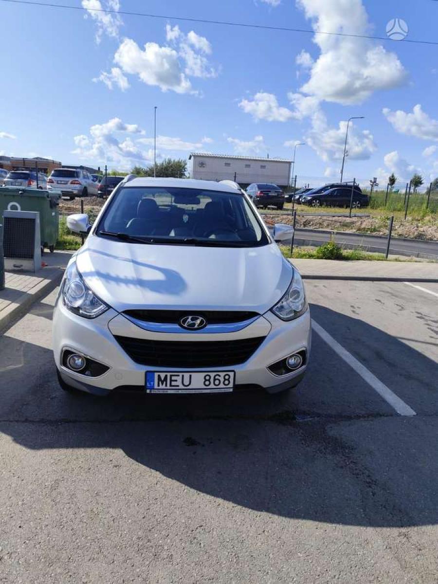 Pelēks Hyundai ix35 2013 Kauņa, ar dzinēja tilpumu 2.00 L un nobraukumu 226 tūkst. km par 8650 €, foto 1 vietnē AUTOMOTO.COM.LV