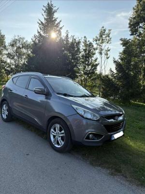 Grey Hyundai ix35 2013 in Marijampole, with an engine capacity of 1.69 L and mileage of 280 thousand km for 5900 €, photo 4 on AUTOMOTO.COM.LV