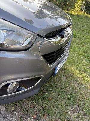 Grey Hyundai ix35 2013 in Marijampole, with an engine capacity of 1.69 L and mileage of 280 thousand km for 5900 €, photo 12 on AUTOMOTO.COM.LV