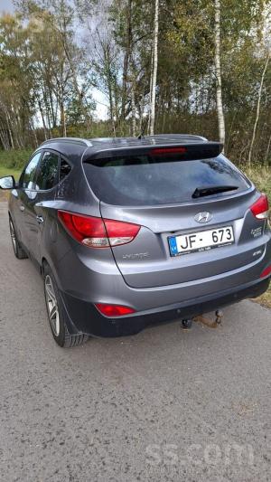 Pelēks Hyundai ix35 2013 Rīga, ar dzinēja tilpumu 2.00 L un nobraukumu 220 tūkst. km par 6200 €, foto 18 vietnē AUTOMOTO.COM.LV