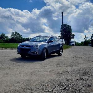 Grey Hyundai ix35 2014 in Marijampole, with an engine capacity of 1.70 L and mileage of 320 thousand km for 4850 €, photo 3 on AUTOMOTO.COM.LV