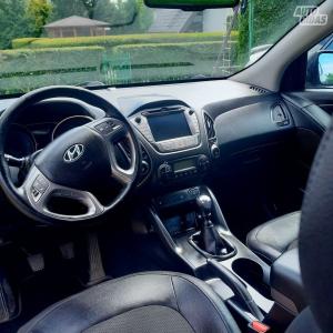 Grey Hyundai ix35 2014 in Marijampole, with an engine capacity of 1.70 L and mileage of 320 thousand km for 4850 €, photo 14 on AUTOMOTO.COM.LV