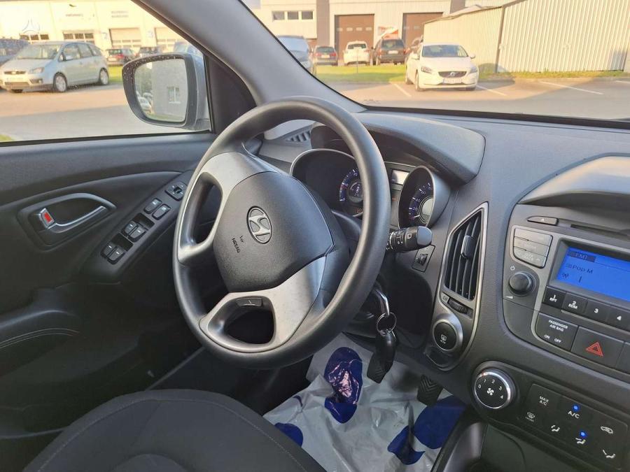 Grey Hyundai ix35 2014 in Jonava, with an engine capacity of 1.69 L and mileage of 178 thousand km for 6250 €, photo 21 on AUTOMOTO.COM.LV