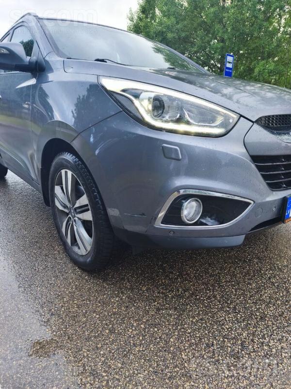 Grey Hyundai ix35 2015 in Riga, with an engine capacity of 2.00 L and mileage of 220 thousand km for 10100 €, photo 6 on AUTOMOTO.COM.LV