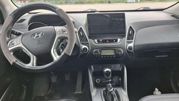 Grey Hyundai ix35 2011 in Marijampole, with an engine capacity of 1.60 L and mileage of 185 thousand km for 4999 €, photo 5 on AUTOMOTO.COM.LV