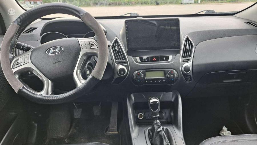 Pelēks Hyundai ix35 2011 Marijampole, ar dzinēja tilpumu 1.60 L un nobraukumu 185 tūkst. km par 4999 €, foto 6 vietnē AUTOMOTO.COM.LV