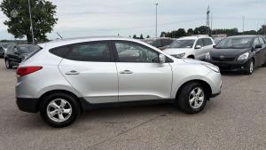 Grey Hyundai ix35 2013 in Marijampole, with an engine capacity of 2.00 L and mileage of 174 thousand km for 7500 €, photo 5 on AUTOMOTO.COM.LV