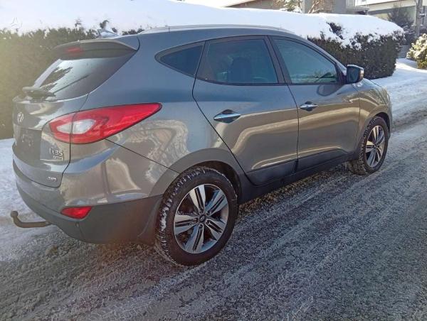 Grey Hyundai ix35 2014 in Marijampole, with an engine capacity of 2.00 L and mileage of 177 thousand km for 8250 €, photo 5 on AUTOMOTO.COM.LV