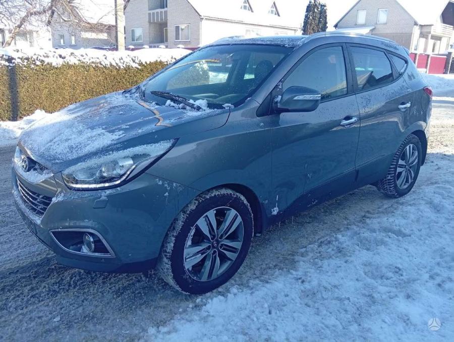 Grey Hyundai ix35 2014 in Marijampole, with an engine capacity of 2.00 L and mileage of 177 thousand km for 8250 €, photo 10 on AUTOMOTO.COM.LV