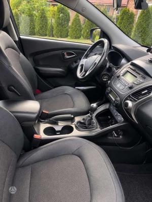 Orange Hyundai ix35 2013 in Vilnius, with an engine capacity of 1.59 L and mileage of 187 thousand km for 6990 €, photo 10 on AUTOMOTO.COM.LV