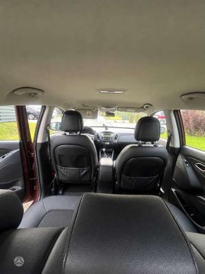 Orange Hyundai ix35 2013 in Vilnius, with an engine capacity of 1.59 L and mileage of 187 thousand km for 6990 €, photo 11 on AUTOMOTO.COM.LV