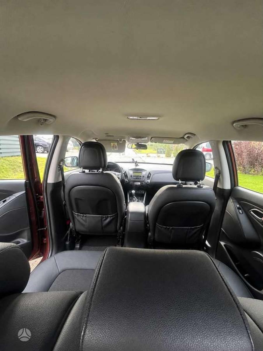Orange Hyundai ix35 2013 in Vilnius, with an engine capacity of 1.59 L and mileage of 187 thousand km for 6990 €, photo 11 on AUTOMOTO.COM.LV