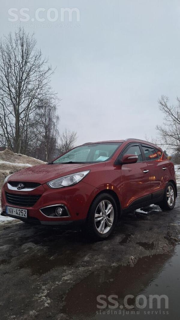 Sarkans Hyundai ix35 2010 Rīga, ar dzinēja tilpumu 2.00 L un nobraukumu 227 tūkst. km par 5600 €, foto 7 vietnē AUTOMOTO.COM.LV