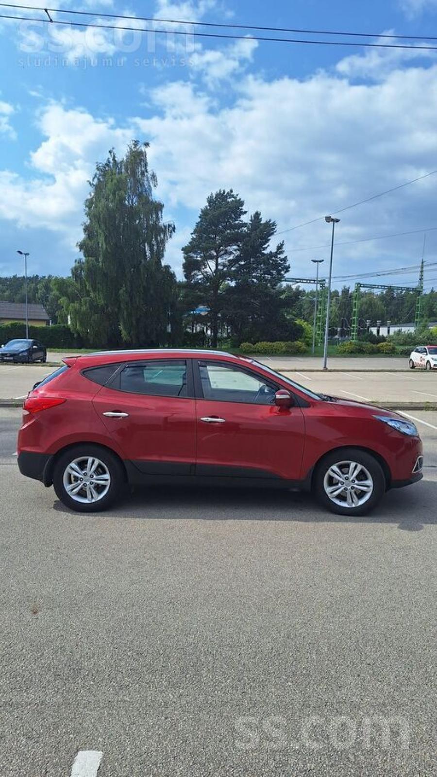 Sarkans Hyundai ix35 2010 Rīga, ar dzinēja tilpumu 2.00 L un nobraukumu 229 tūkst. km par 5199 €, foto 3 vietnē AUTOMOTO.COM.LV