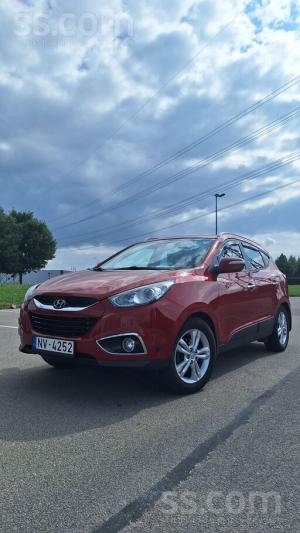 Sarkans Hyundai ix35 2010 Rīga, ar dzinēja tilpumu 2.00 L un nobraukumu 229 tūkst. km par 5199 €, foto 7 vietnē AUTOMOTO.COM.LV