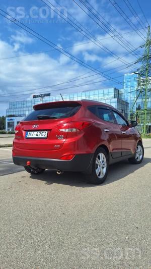 Sarkans Hyundai ix35 2010 Rīga, ar dzinēja tilpumu 2.00 L un nobraukumu 229 tūkst. km par 5199 €, foto 8 vietnē AUTOMOTO.COM.LV