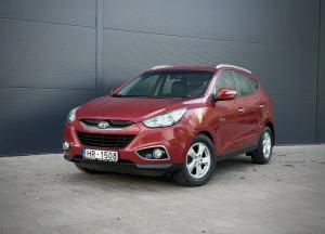 Sarkans Hyundai ix35 2011 Rīga, ar dzinēja tilpumu 1.70 L un nobraukumu 247 tūkst. km par 5495 €, foto  vietnē AUTOMOTO.COM.LV