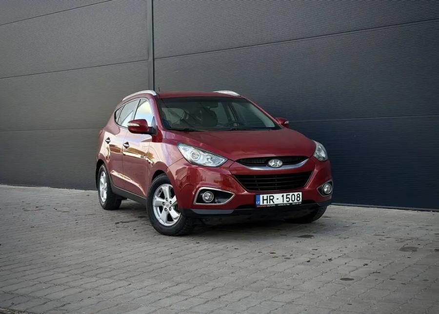 Red Hyundai ix35 2011 in Riga, with an engine capacity of 1.70 L and mileage of 247 thousand km for 5495 €, photo 5 on AUTOMOTO.COM.LV