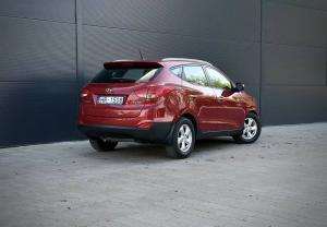 Red Hyundai ix35 2011 in Riga, with an engine capacity of 1.70 L and mileage of 247 thousand km for 5495 €, photo 7 on AUTOMOTO.COM.LV