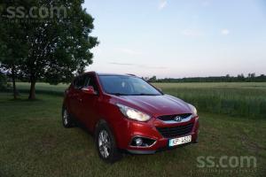 Sarkans Hyundai ix35 2011 Rīga, ar dzinēja tilpumu 2.00 L un nobraukumu 231 tūkst. km par 6500 €, foto  vietnē AUTOMOTO.COM.LV