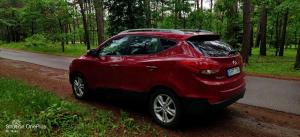 Red Hyundai ix35 2011 in Vilnius, with an engine capacity of 2.00 L and mileage of 114 thousand km for 6800 €, photo 5 on AUTOMOTO.COM.LV