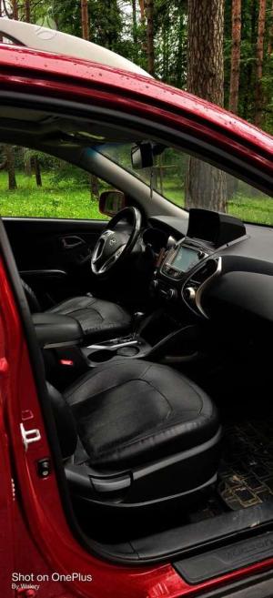 Red Hyundai ix35 2011 in Vilnius, with an engine capacity of 2.00 L and mileage of 114 thousand km for 6800 €, photo 7 on AUTOMOTO.COM.LV