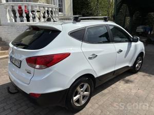 Balts Hyundai ix35 2011 Rīga, ar dzinēja tilpumu 1.70 L un nobraukumu 261 tūkst. km par 4800 €, foto 7 vietnē AUTOMOTO.COM.LV