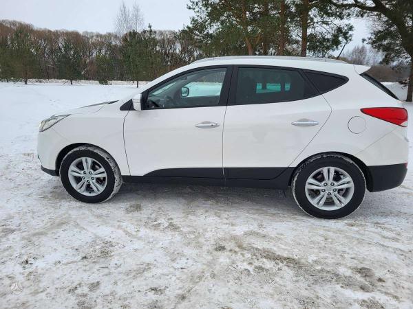 Balts Hyundai ix35 2012 Tauragė, ar dzinēja tilpumu 2.00 L un nobraukumu 235 tūkst. km par 5500 €, foto 7 vietnē AUTOMOTO.COM.LV