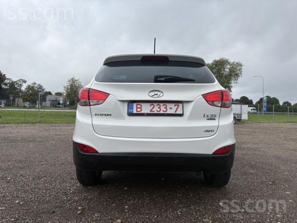 White Hyundai ix35 2012 in Daugavpils, with an engine capacity of 2.00 L and mileage of 167 thousand km for 6450 €, photo 7 on AUTOMOTO.COM.LV