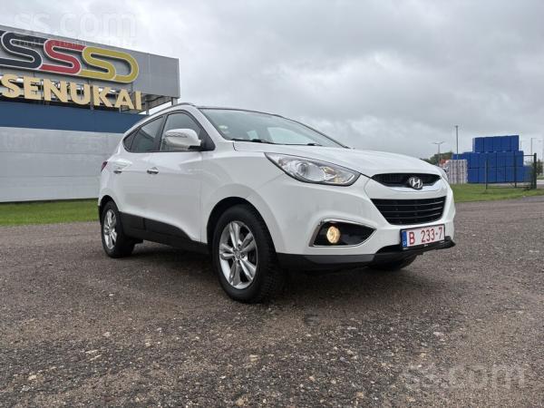 White Hyundai ix35 2012 in Daugavpils, with an engine capacity of 2.00 L and mileage of 167 thousand km for 6450 €, photo 8 on AUTOMOTO.COM.LV