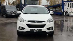 White Hyundai ix35 2012 in Ukmerge, with an engine capacity of 1.69 L and mileage of 220 thousand km for 4550 €, photo 6 on AUTOMOTO.COM.LV