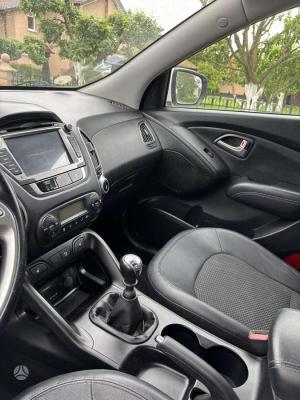 Balts Hyundai ix35 2013 Jurbarkas, ar dzinēja tilpumu 2.00 L un nobraukumu 199 tūkst. km par 5600 €, foto 13 vietnē AUTOMOTO.COM.LV