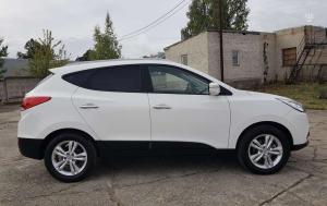 White Hyundai ix35 2013 in Siauliai, with an engine capacity of 1.69 L and mileage of 225 thousand km for 5700 €, photo 6 on AUTOMOTO.COM.LV