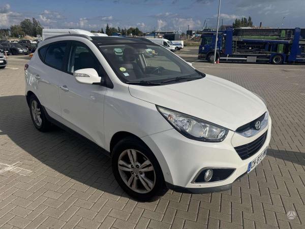 Balts Hyundai ix35 2012 Tauragė, ar dzinēja tilpumu 1.70 L un nobraukumu 254 tūkst. km par 4700 €, foto 4 vietnē AUTOMOTO.COM.LV