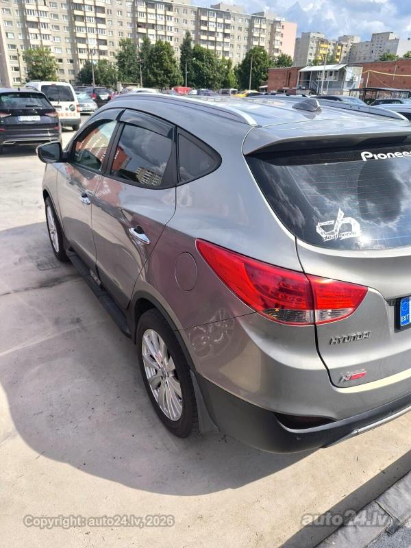 Yellow Hyundai ix35 2010 in Tallinn, with an engine capacity of 2.00 L and mileage of 174 thousand km for 7500 €, photo 2 on AUTOMOTO.COM.LV
