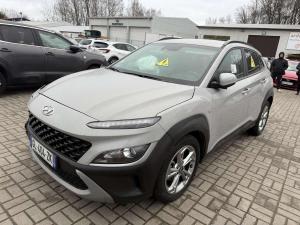 Grey Hyundai Kona 2023 in Kaunas, with an engine capacity of 1.00 L and mileage of 21 thousand km for 8900 €, photo  on AUTOMOTO.COM.LV