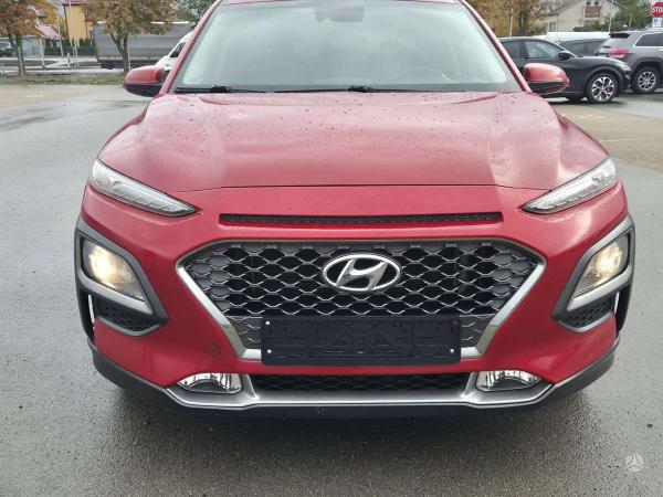 Red Hyundai Kona 2018 in Siauliai, with an engine capacity of 1.00 L and mileage of 203 thousand km for 9450 €, photo 11 on AUTOMOTO.COM.LV