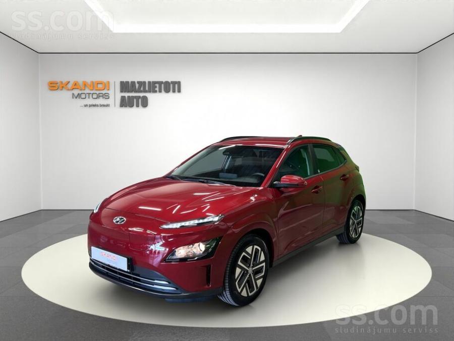 Sarkans Hyundai Kona 2022 Rīga, ar dzinēja tilpumu 1.00 L un nobraukumu 30 tūkst. km par 22490 €, foto 1 vietnē AUTOMOTO.COM.LV