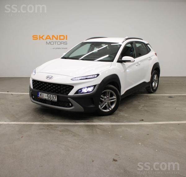 White Hyundai Kona 2021 in Riga, with an engine capacity of 1.00 L and mileage of 64 thousand km for 14990 €, photo 1 on AUTOMOTO.COM.LV